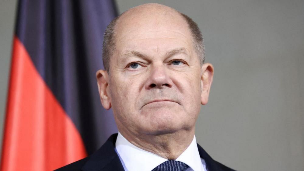 Olaf Scholz critică propunerea lui Donald Trump privind schimbul de ajutor pentru resursele ...